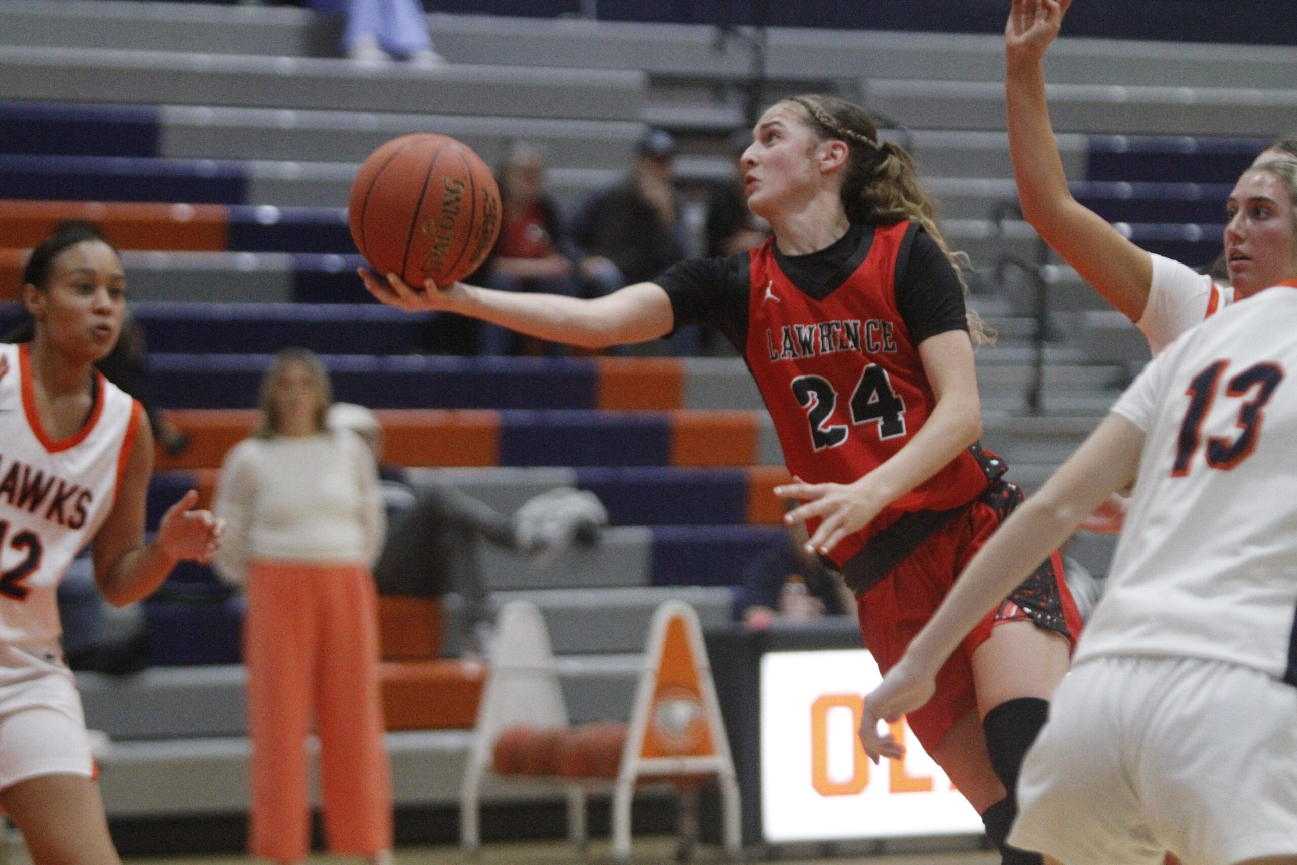 Defense leads Lawrence girls basketball to road win; Lawrence boys ...